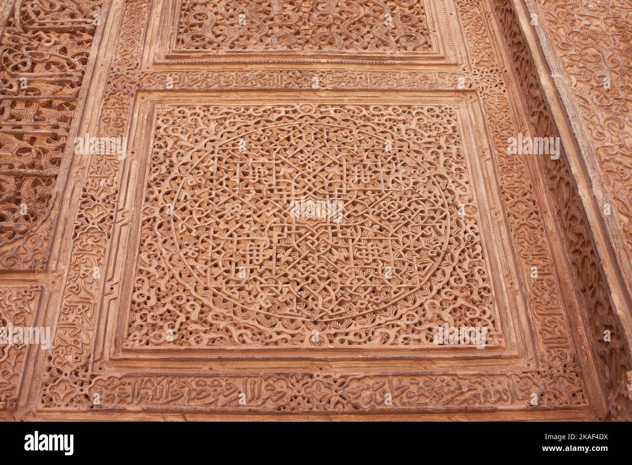 A closeup of a Moroccan-style wall with ancient architectural details ...