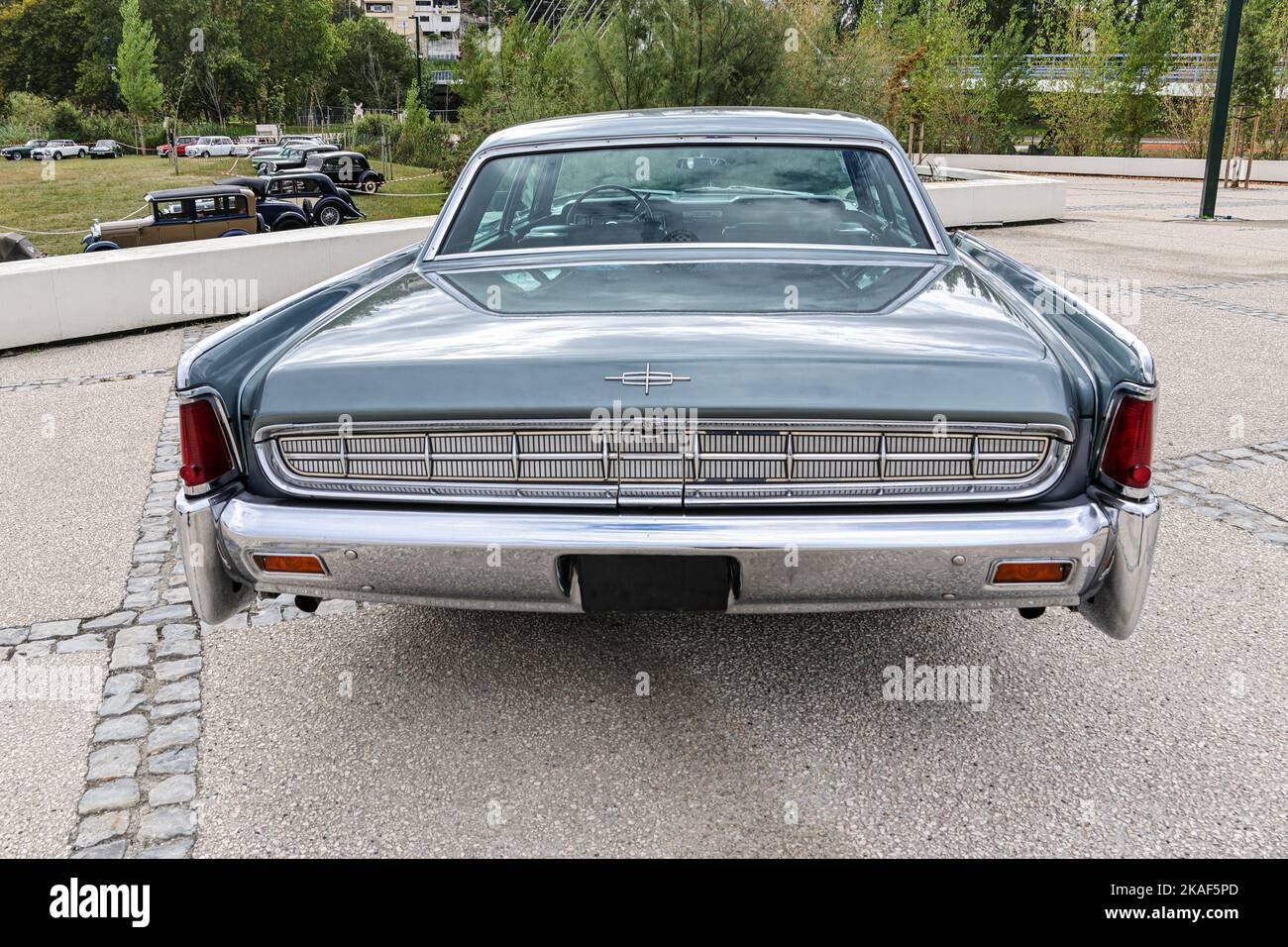 A rear view of blue Lincoln Continental car during an exhibition in a ...