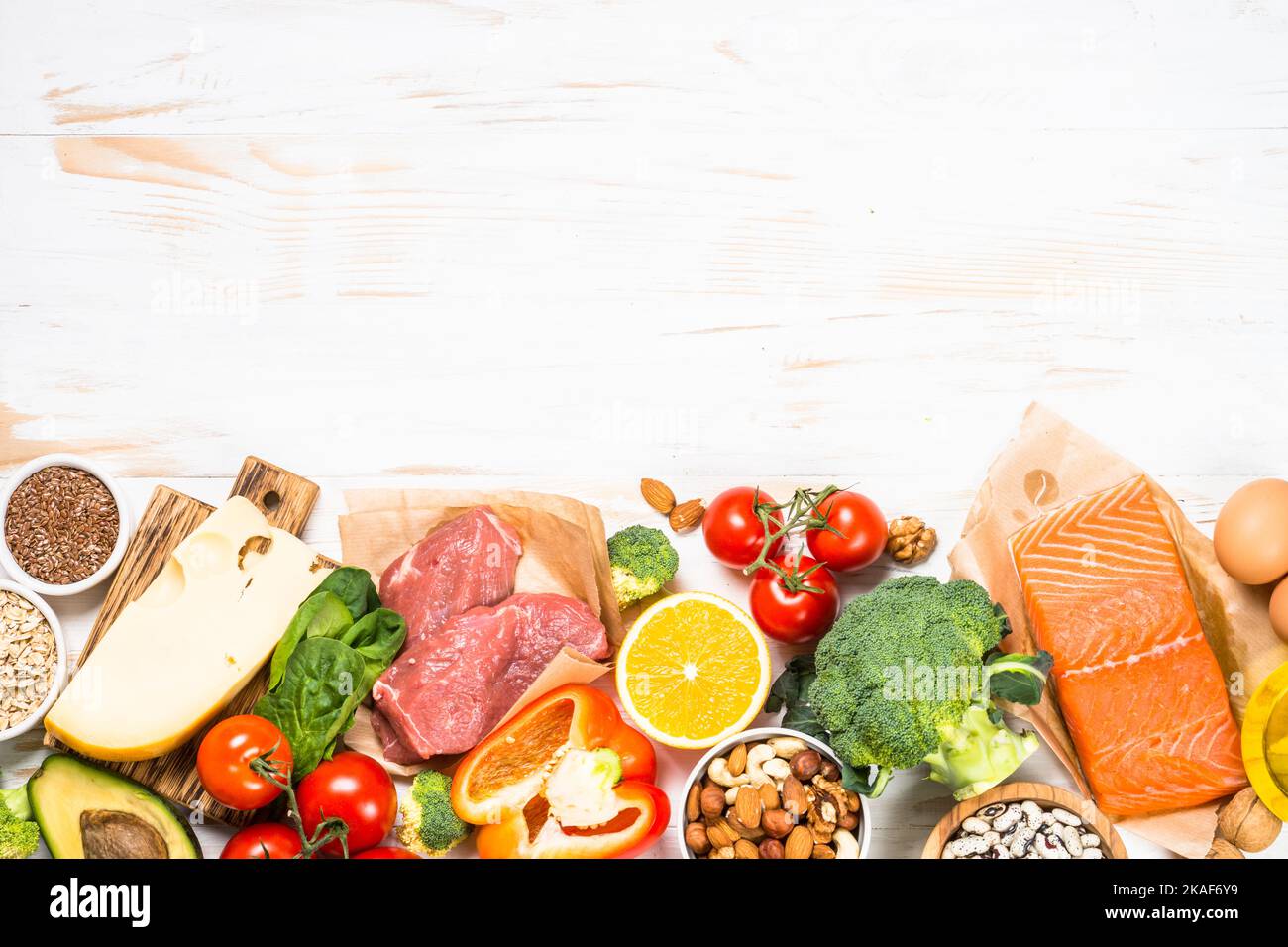 Healthy fats products at black background Stock Photo - Alamy