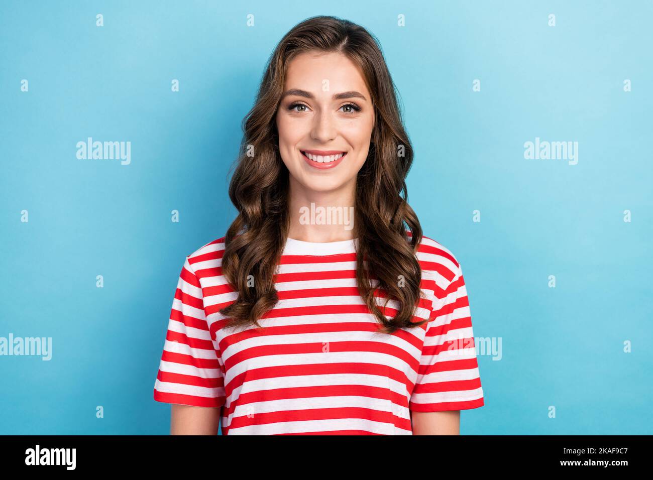 Photo of charming positive young girl dressed red outfit smiling ...