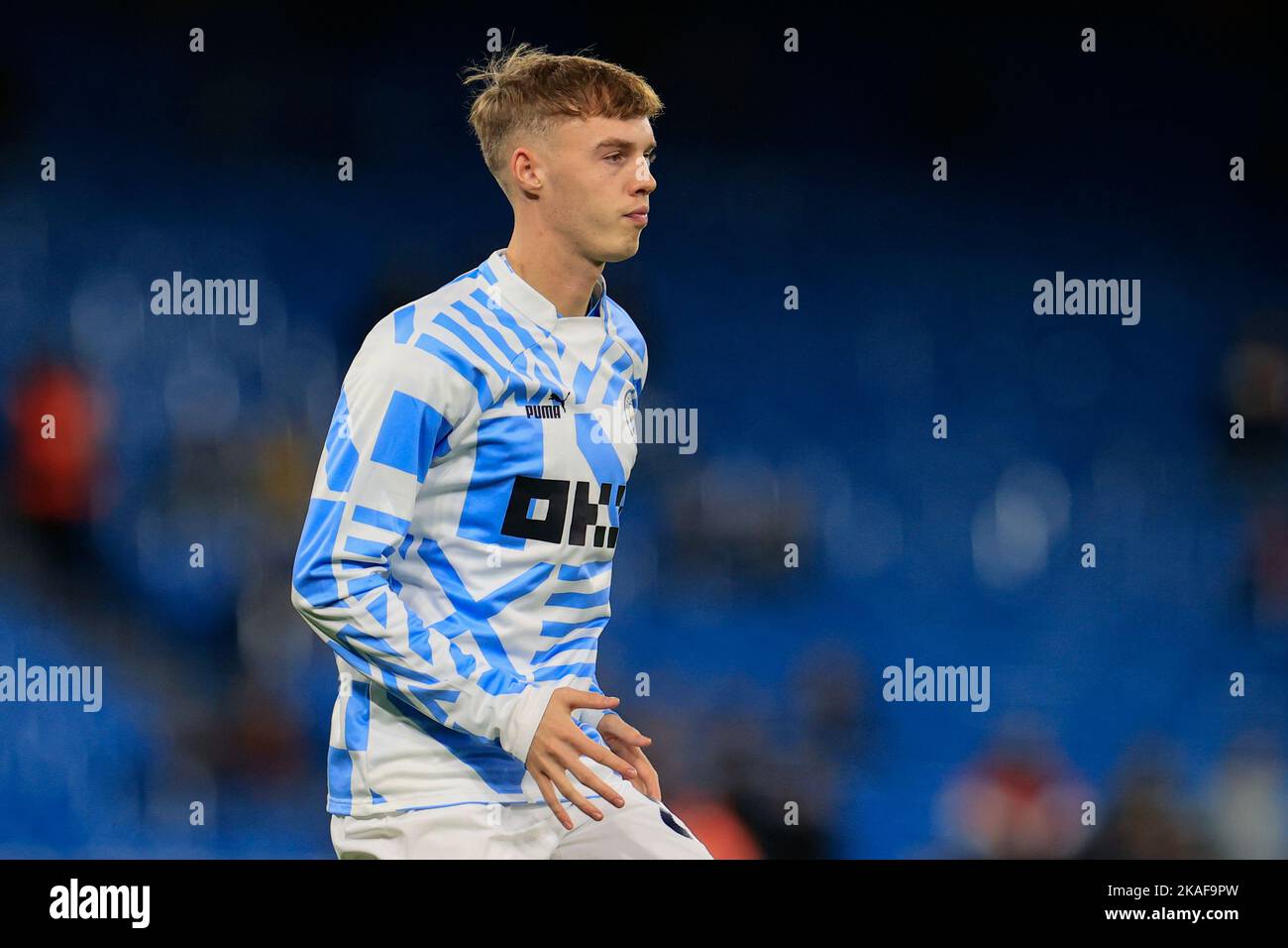 Cole Palmer #80 of Manchester City warms up for the game ahead of the ...