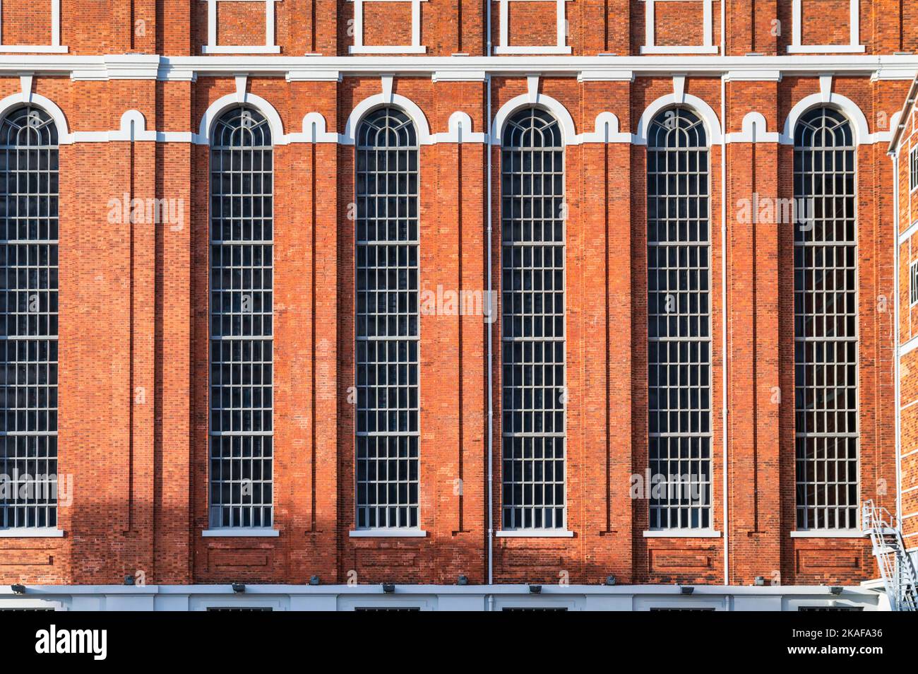 old factory brick wall with large windows, electricity museum off ...