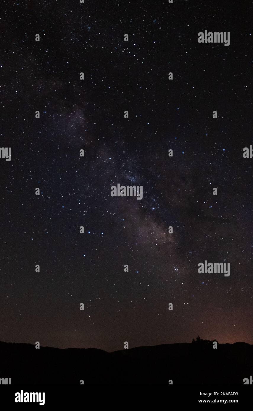 A vertical of the Milky Way illuminating the night sky from the ...