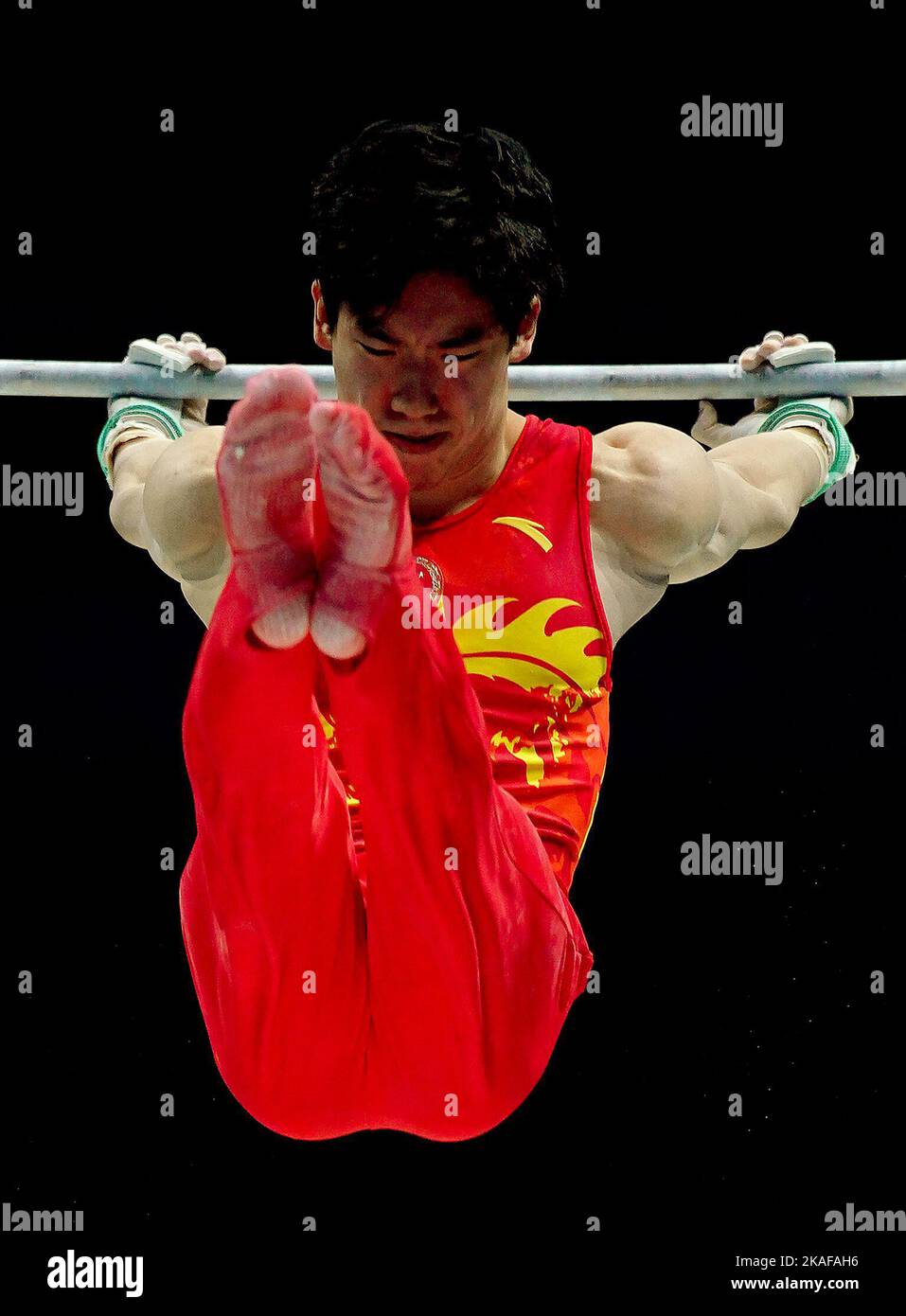 China's Zhang Boheng performs on the parallel bars during day five of ...