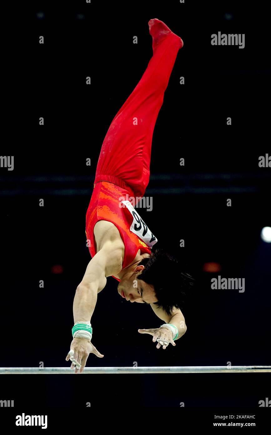 China's Zhang Boheng performs on the parallel bars during day five of ...