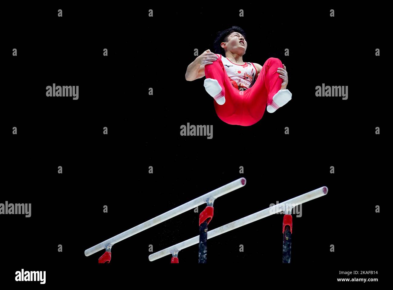 Japan's Kakeru Tanigawa performs on the parallel bars during day five ...