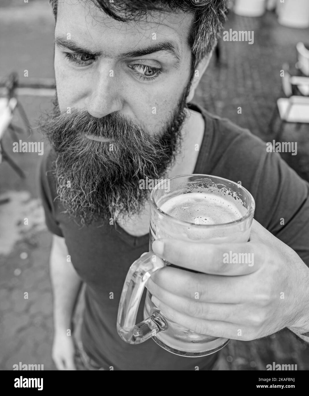Guy having rest with cold draught beer. Draught beer concept. Man with ...