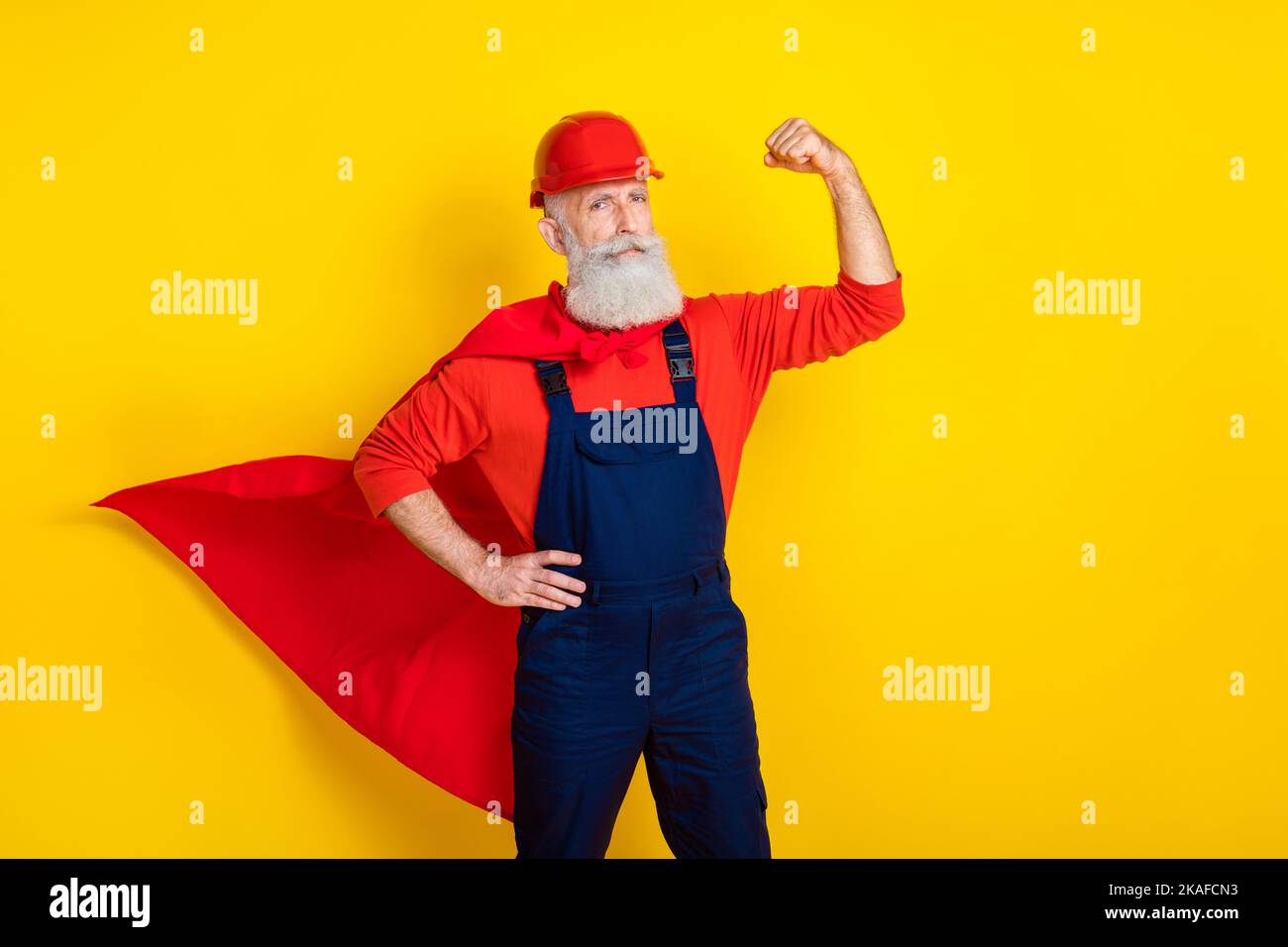 Photo of confident strong age man wear overall uniform red hard hat ...