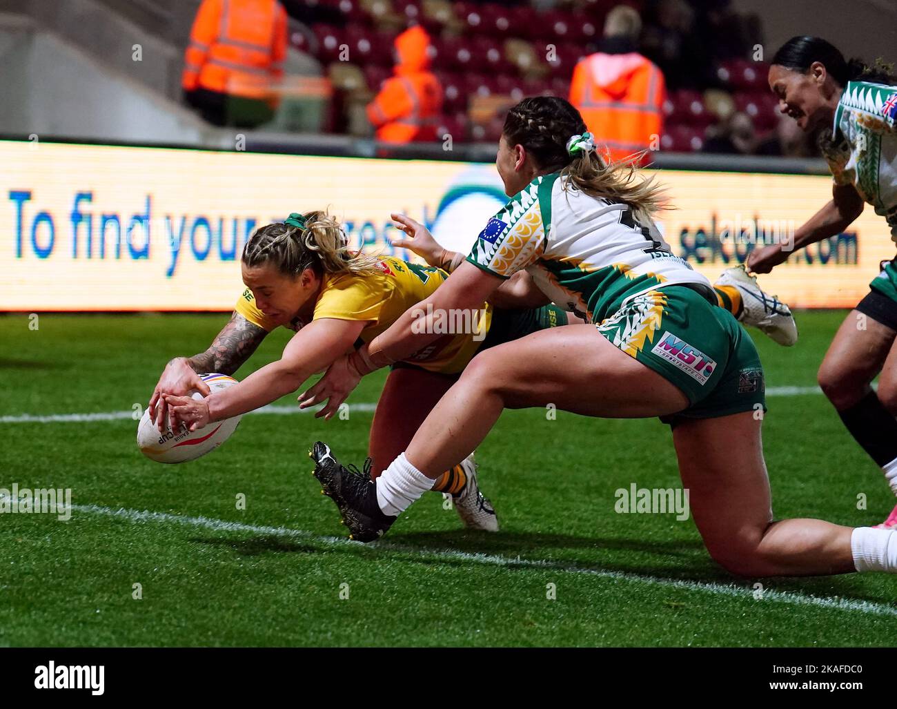 Australia’s Julia Robinson dives in to score a try during the Women's ...