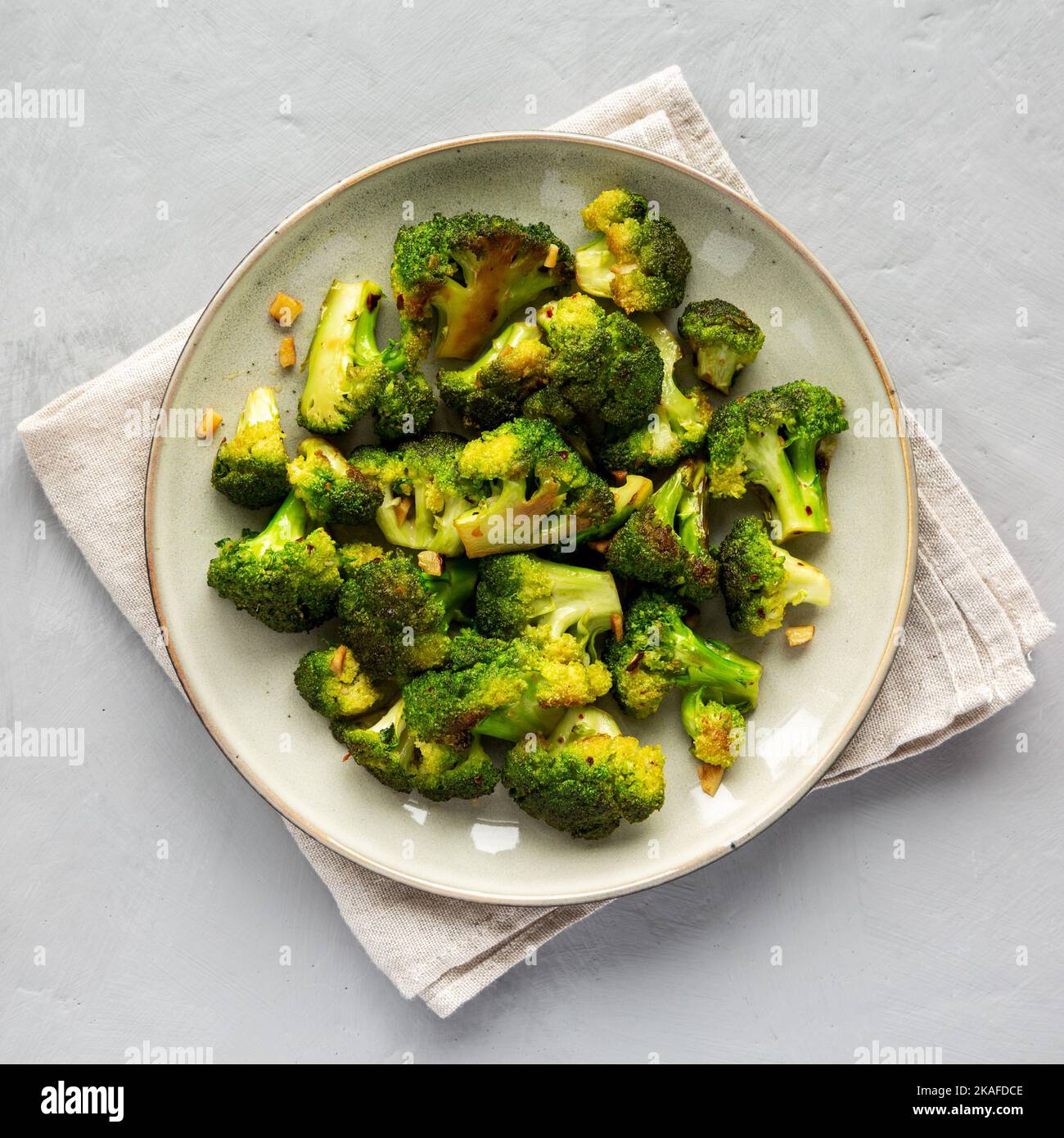 Homemade Pan-Fried Broccoli on a Plate, top view. Flat lay, overhead ...