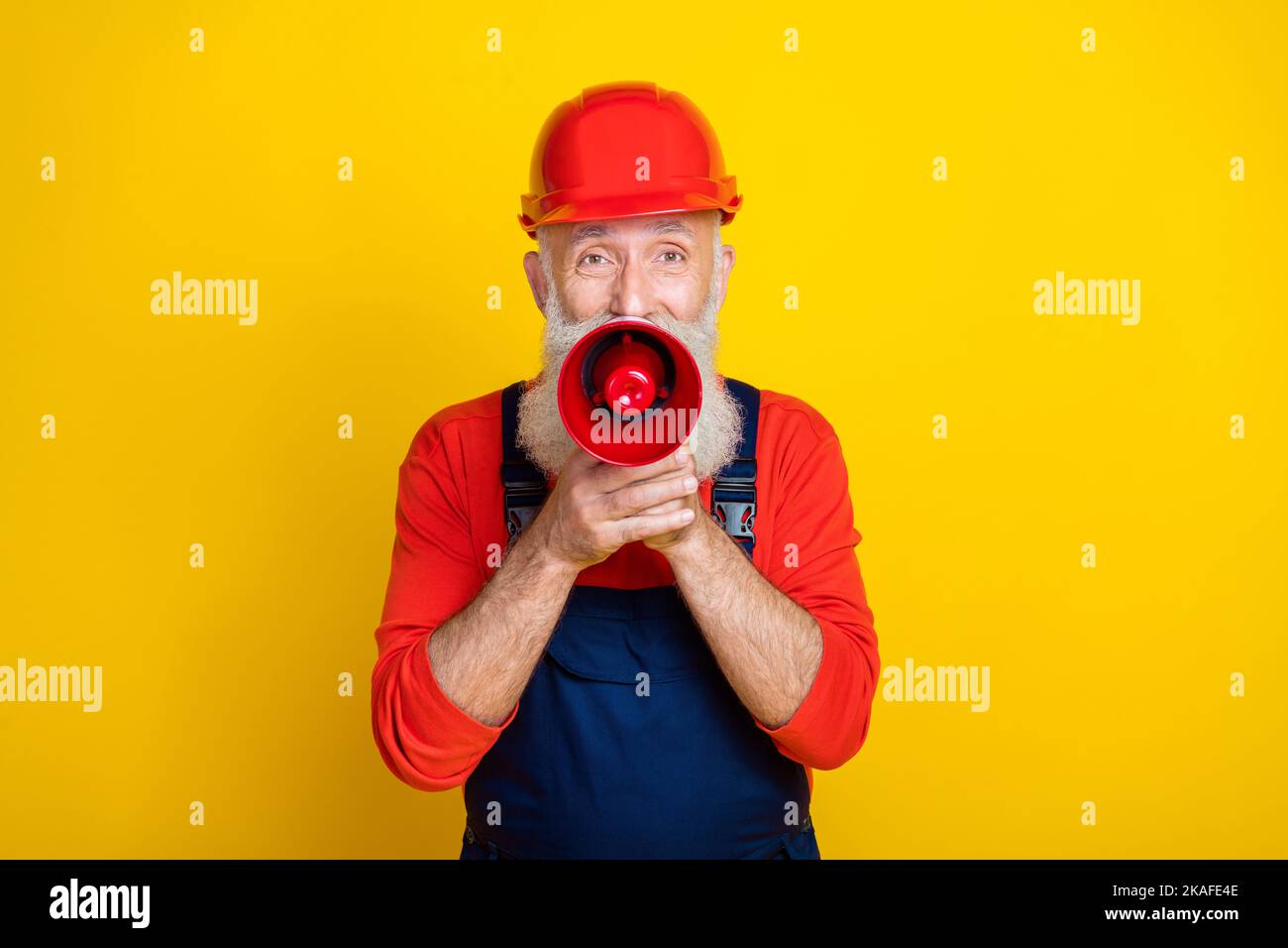 Photo of funky retired workman artisan carpenter use bullhorn speak ...