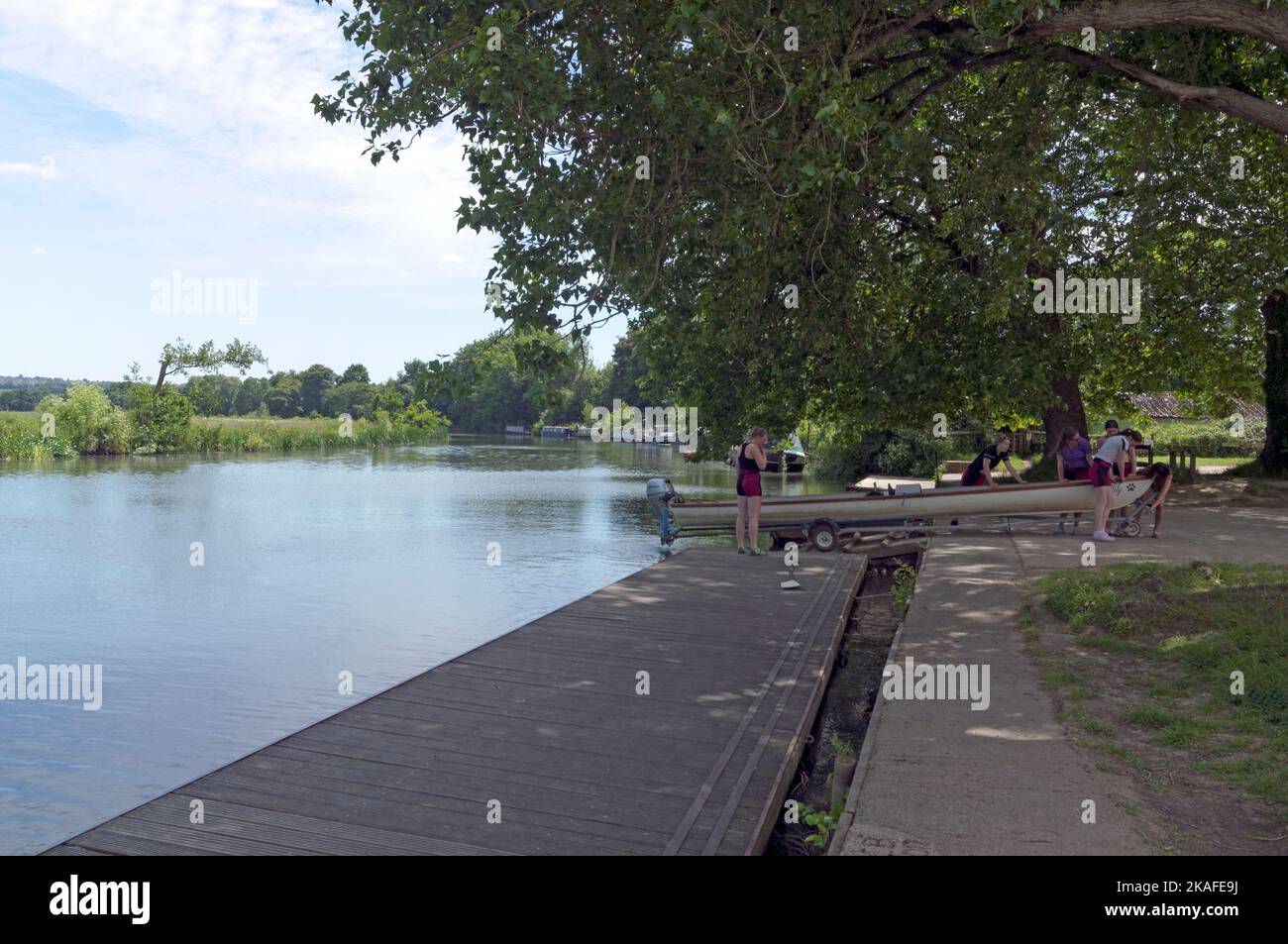Women rowers on the banks of the river Avon at Saltford with their boat ...