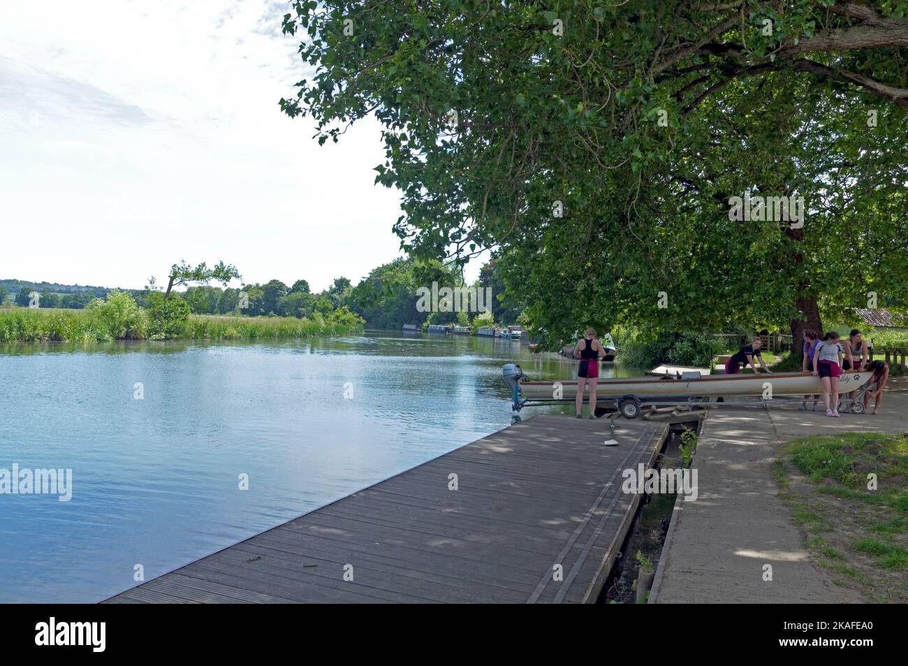 Women rowers on the banks of the river Avon at Saltford with their boat ...