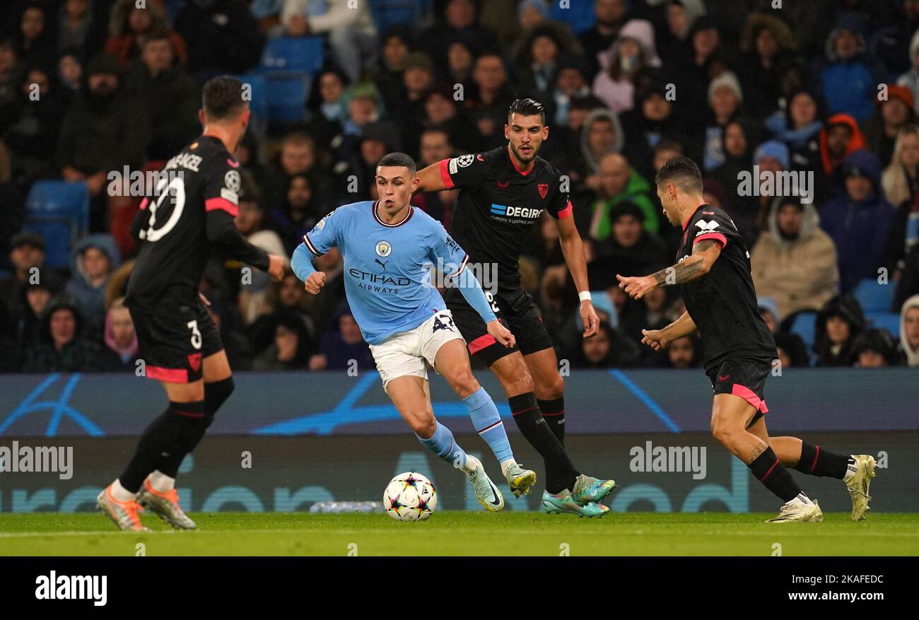 Manchester City's Phil Foden controls the ball under pressure during ...