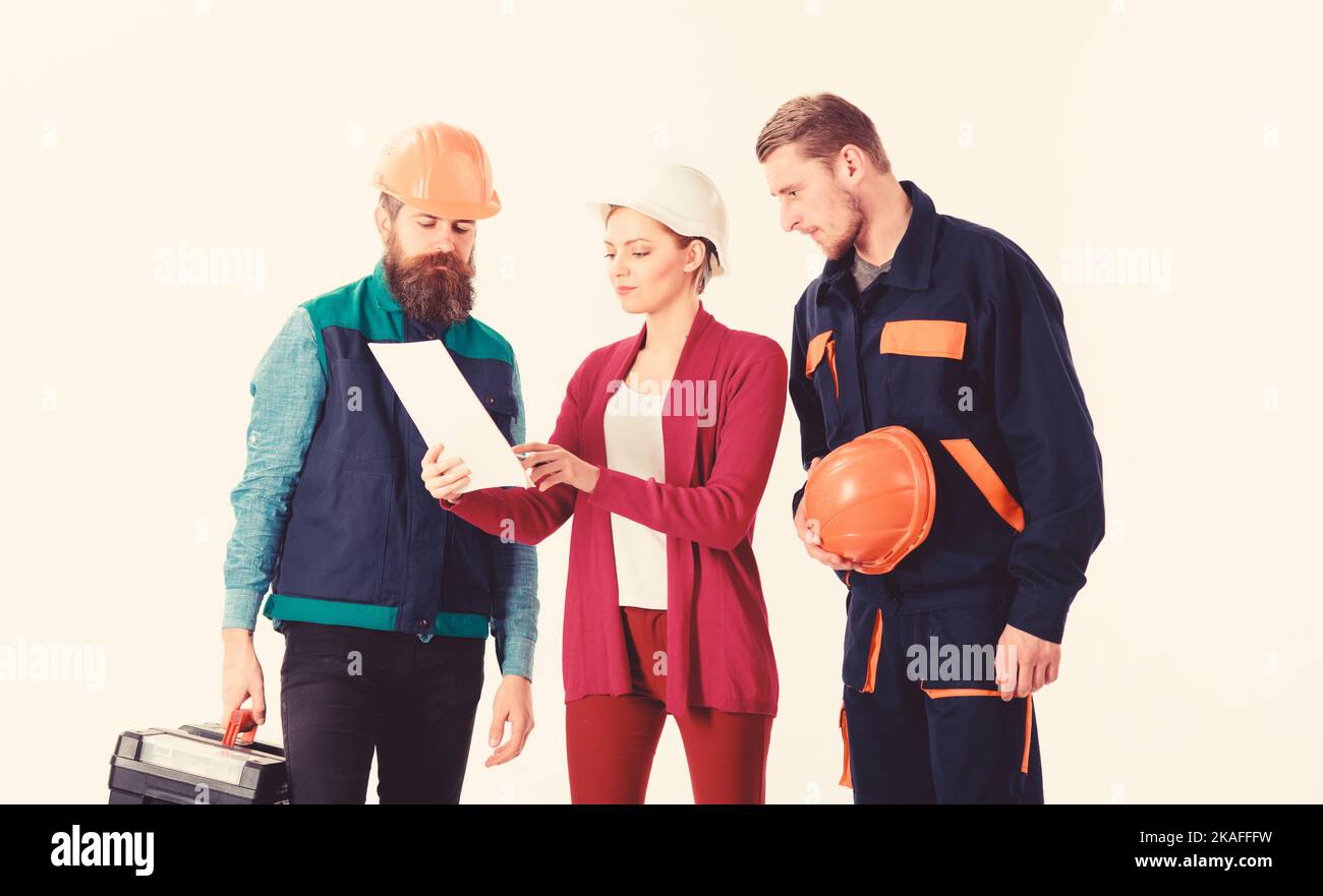 Builders and engineer work together. Management concept Stock Photo - Alamy