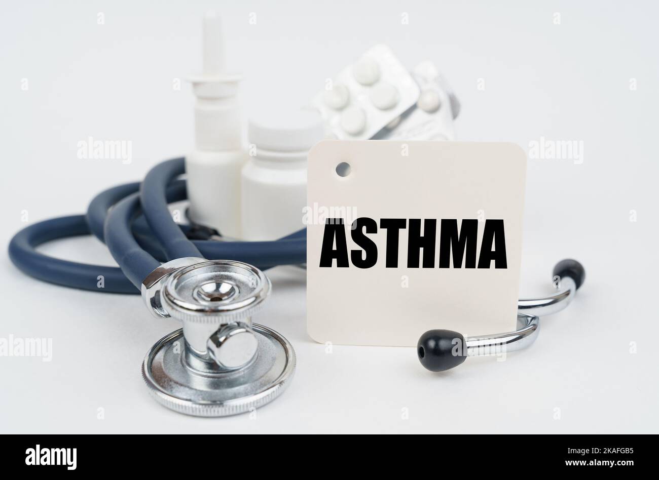 Medical concept. On a white surface, medicines, a stethoscope and ...