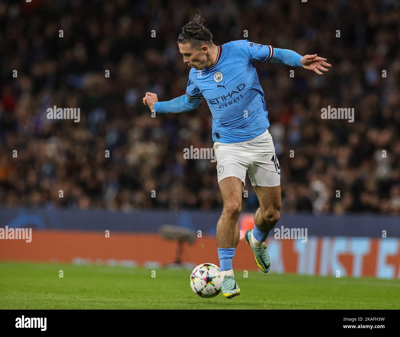 Jack Grealish #10 of Manchester City tries to control the ball during ...