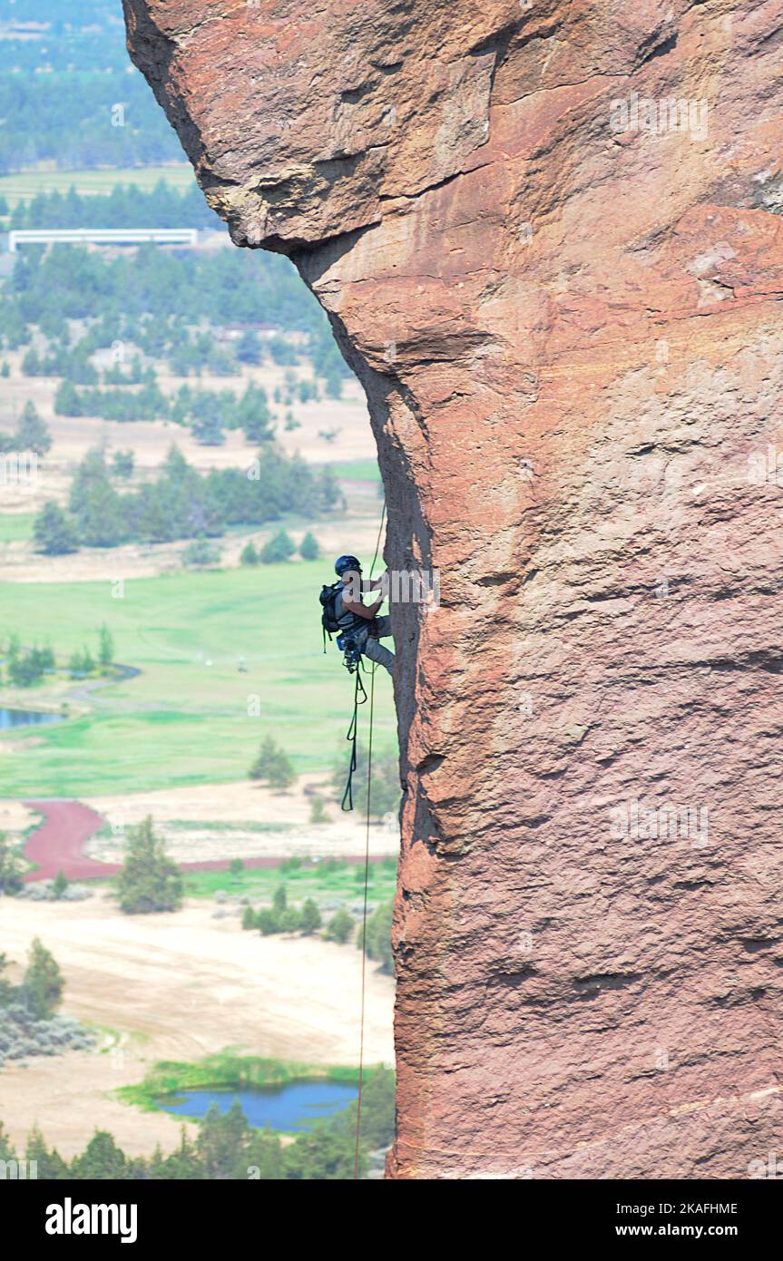 A vertical shot of a climber in Monkey Face, Smith Rock State Park ...