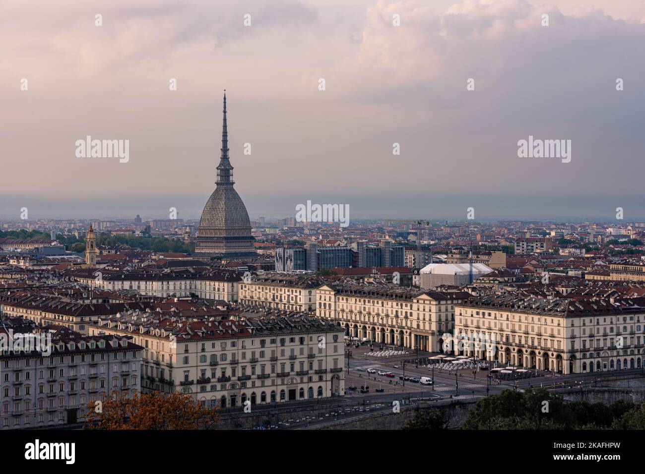 The beautiful view of the buildings during the sunset in Turin ...