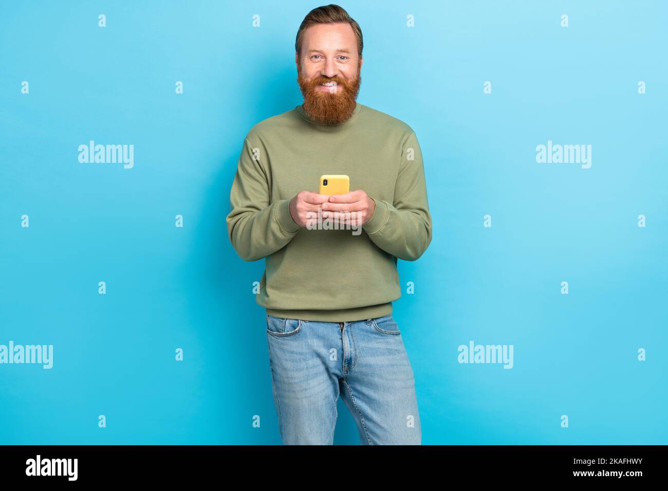 Photo of positive cheerful optimistic guy with red hairstyle dressed ...