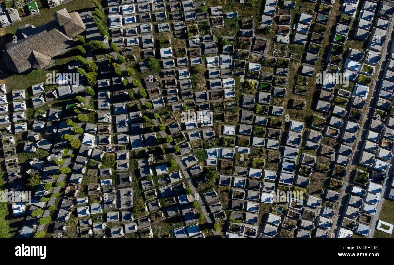 An aerial view of a cemetery located in the city of Reghin, Romania ...