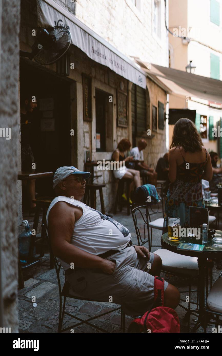 A vertical shot of an outdoor cafe in Montenegro Stock Photo - Alamy