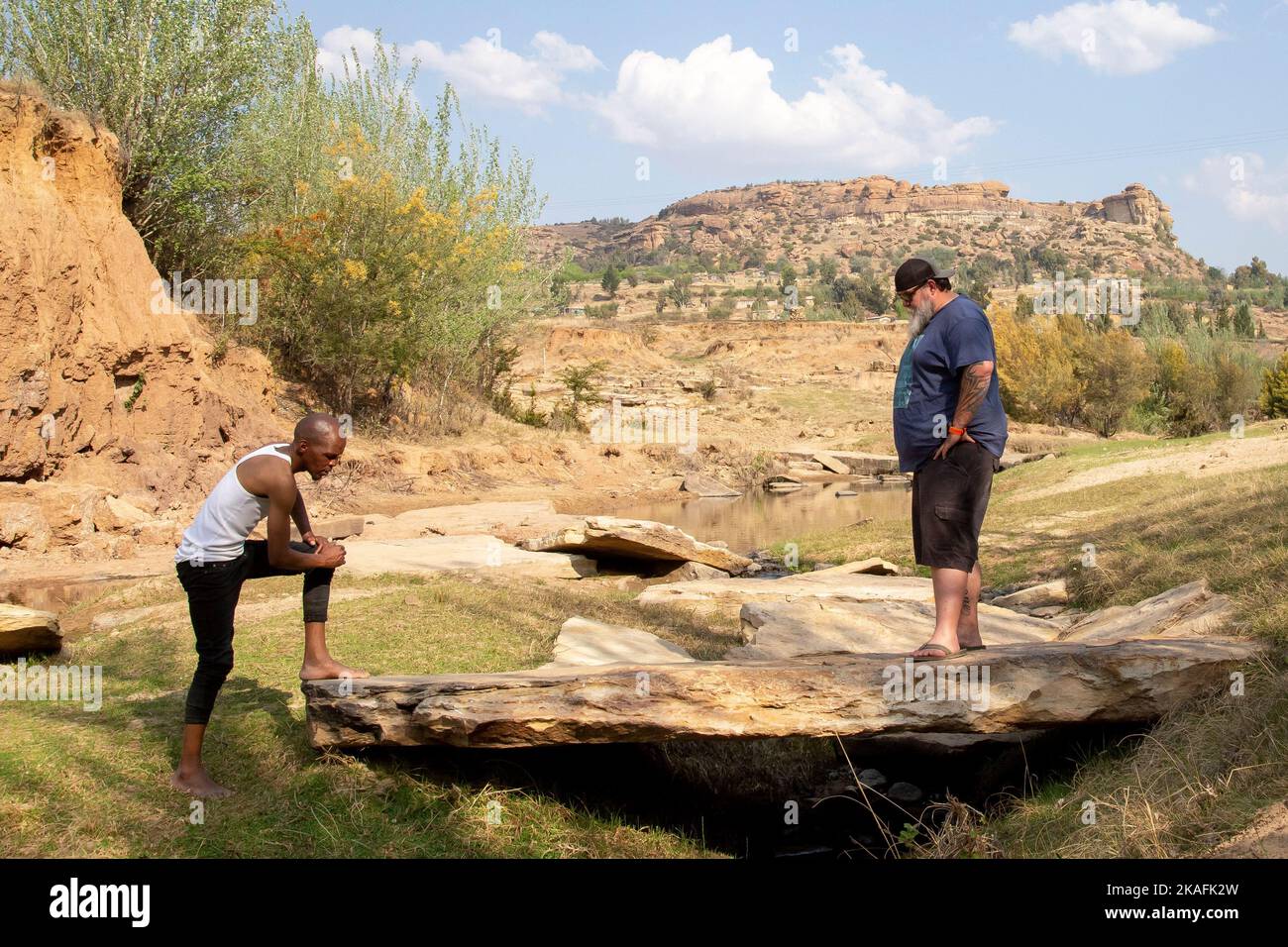 African tour guide river bed looking down Stock Photo - Alamy