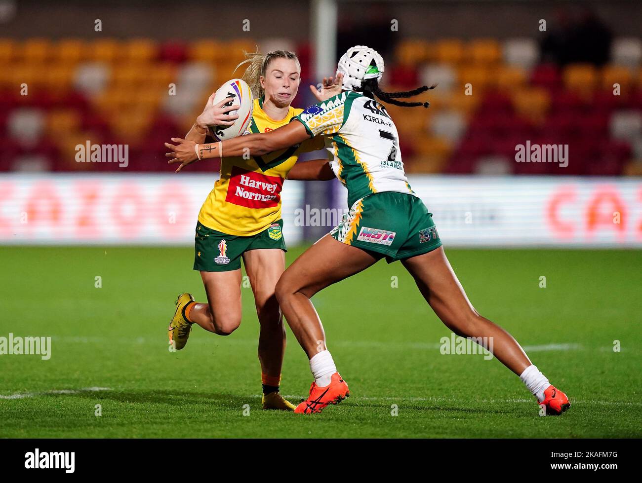 Australia’s Tarryn Aiken is tackled by Cook Islands’ Chantay Kiria-Ratu ...