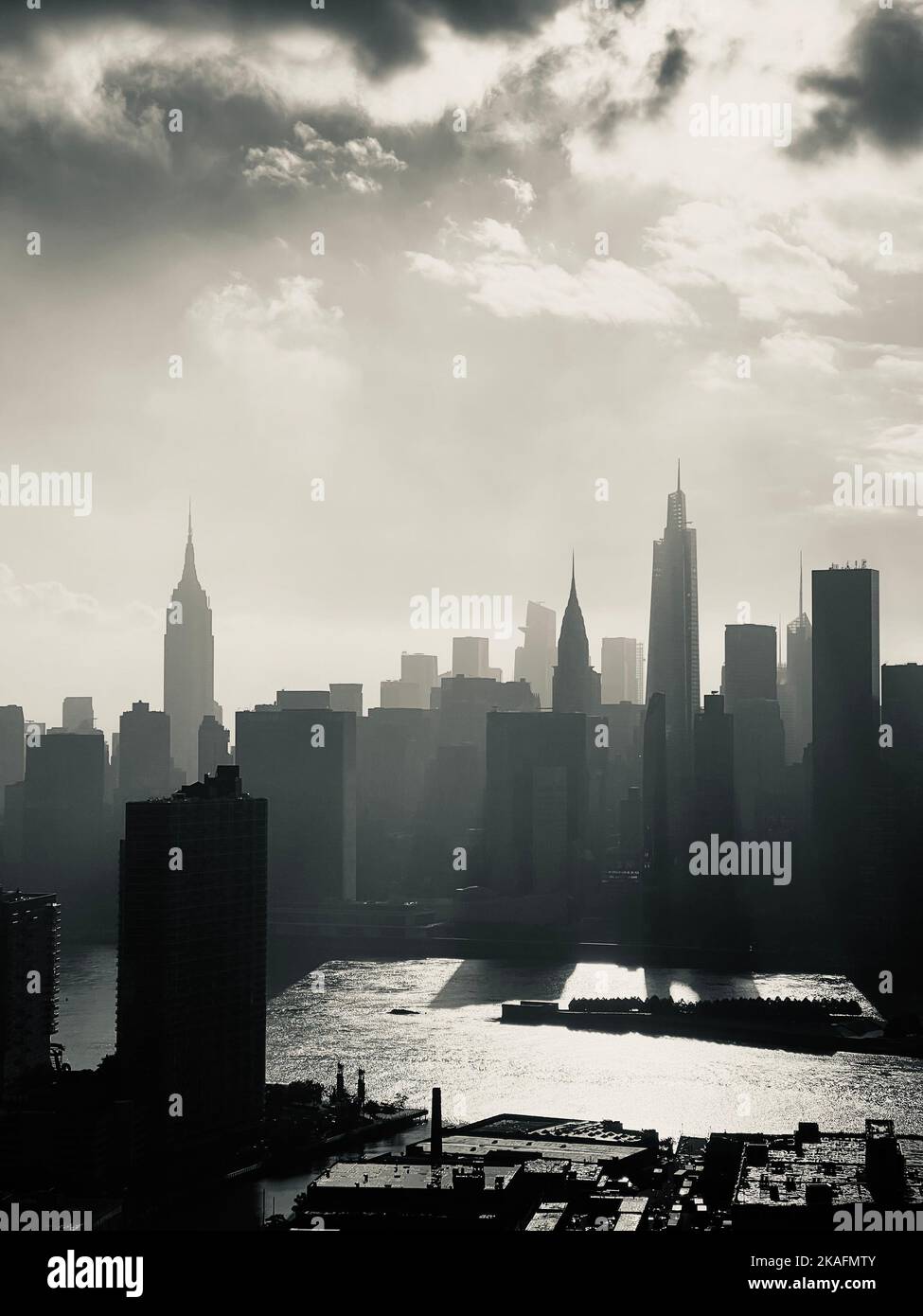 A vertical aerial shot of the Manhattan skyline from Queens Court ...