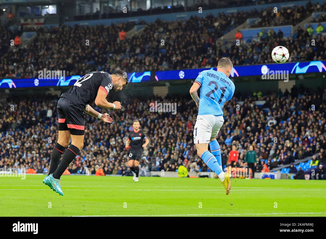 Rafa Mir #12 of Sevilla heads the ball on goal during the UEFA ...
