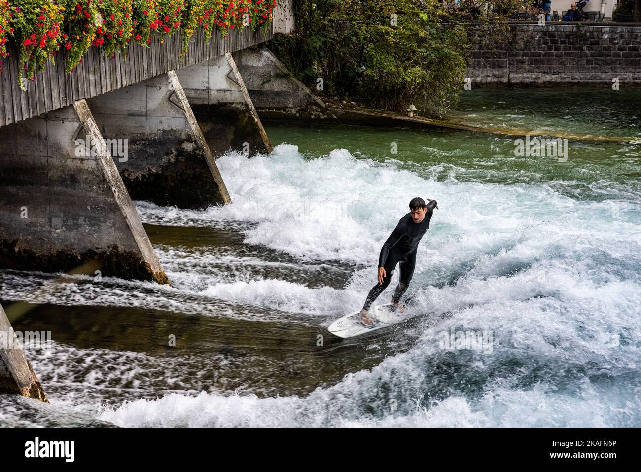 A surfer on the Aare river in Thun, Switzerland Stock Photo - Alamy
