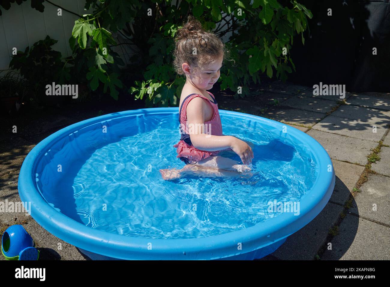 Backyard pool kids hi-res stock photography and images - Alamy