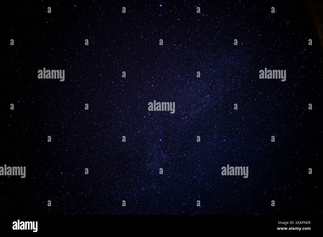 A view of a night sky with small stars shining in the far Stock Photo ...