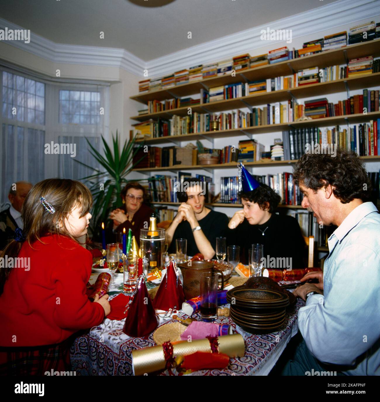 Family Having Christmas Dinner Father Cutting Christmas Pudding Surrey ...