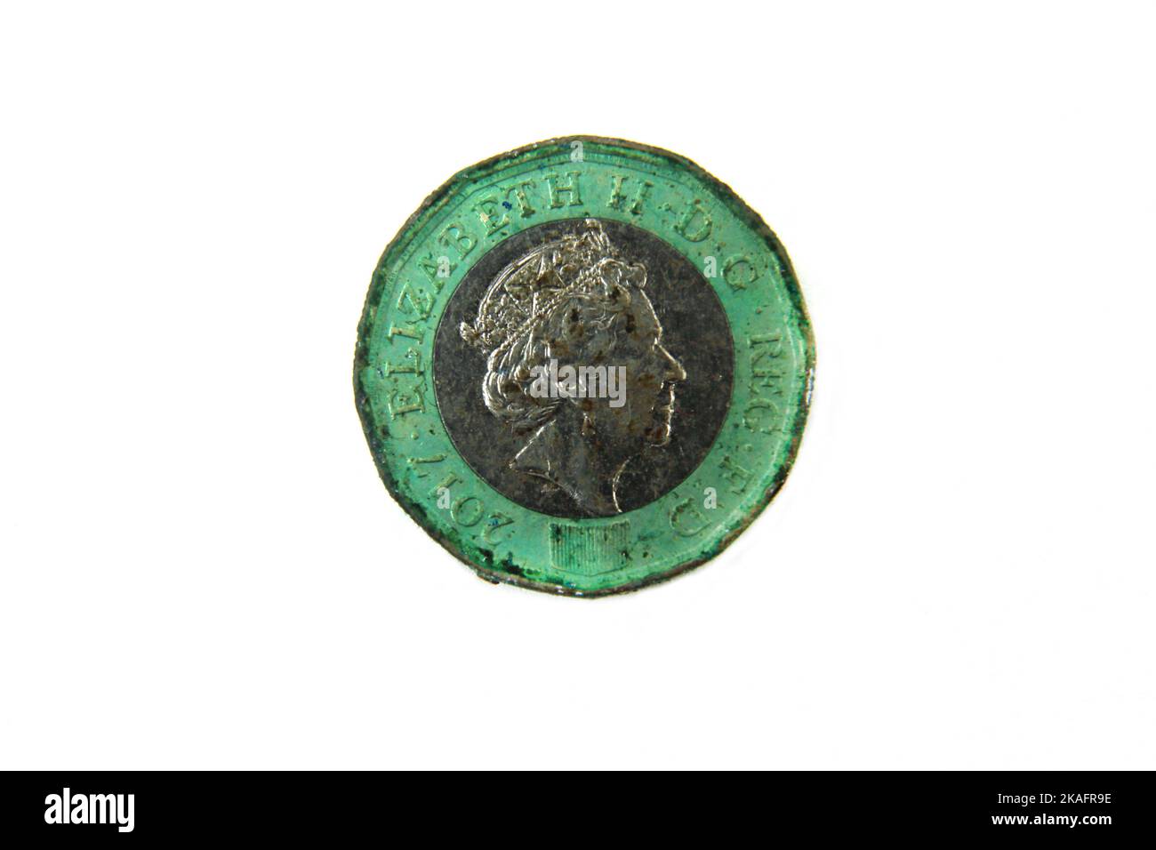British Pound Coin going Green from Oxidation Stock Photo - Alamy