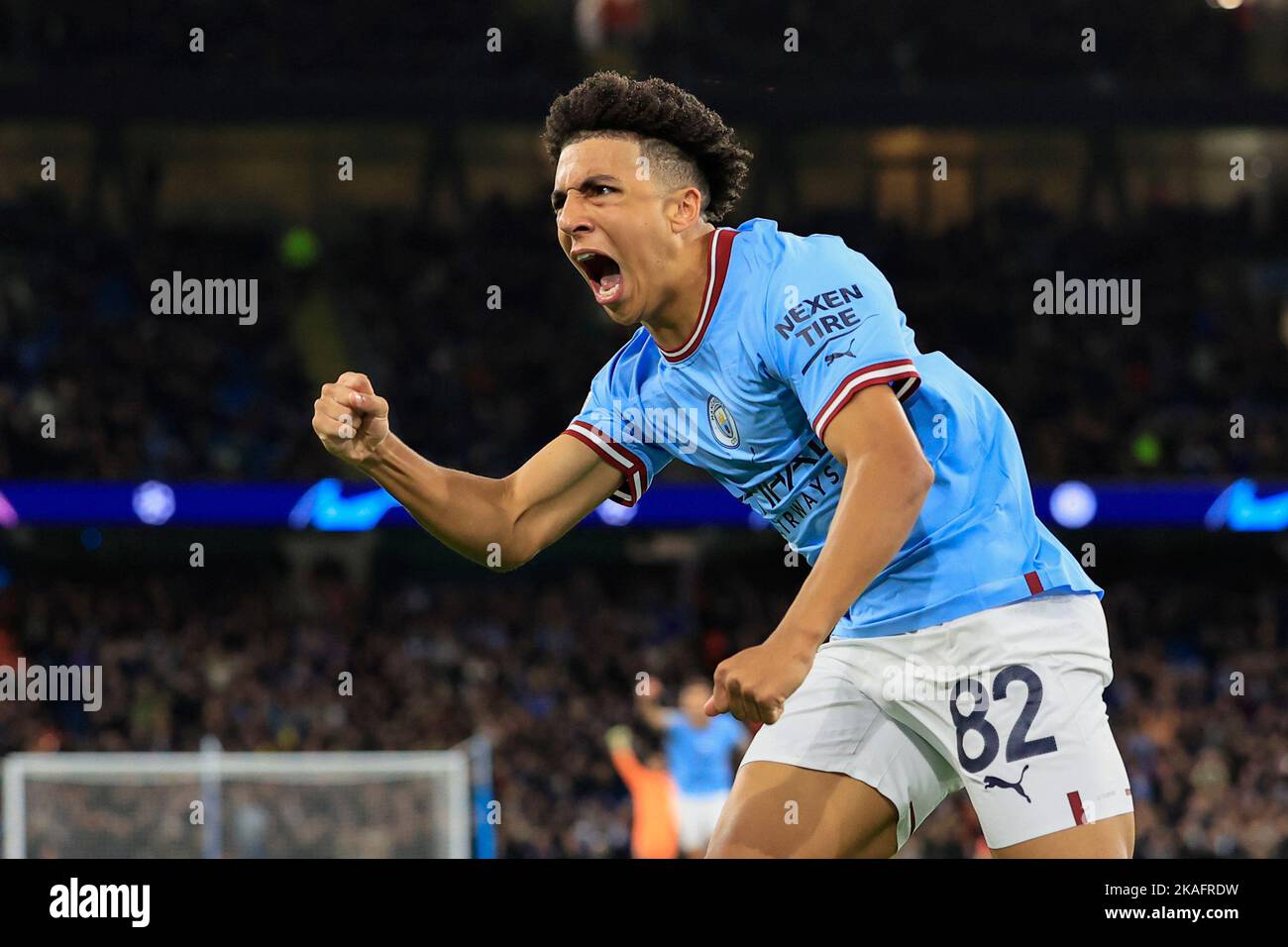 Rico Lewis #82 of Manchester City celebrates scoring to make it 1-1 ...