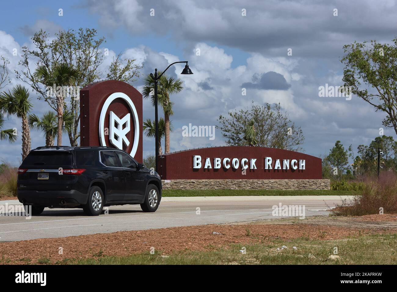 A car is seen entering Babcock Ranch, Florida, the first solar-powered ...