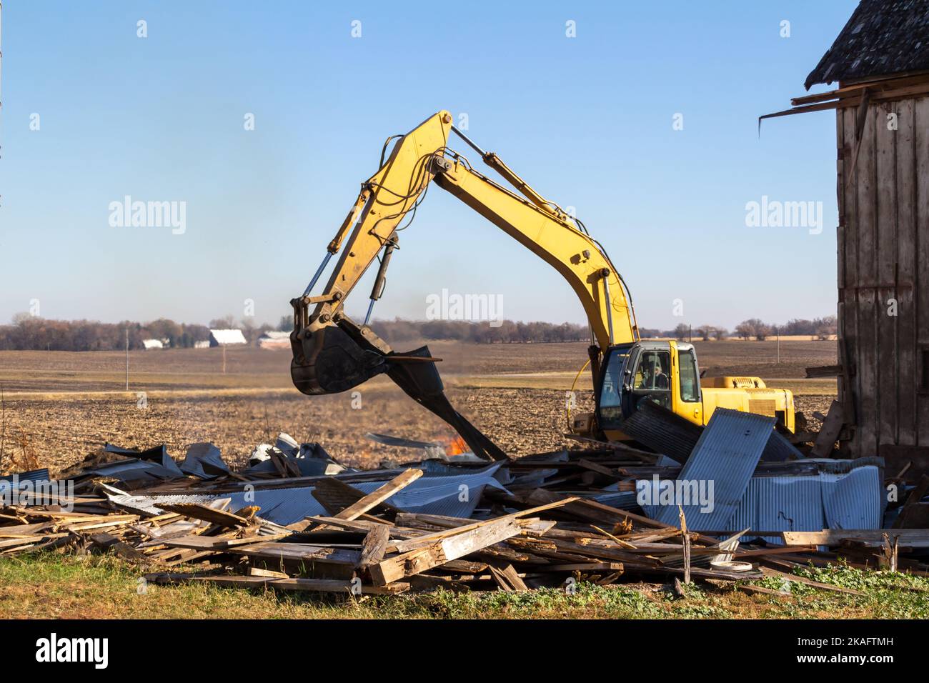 This image shows a close up view of a heavy equipment excavator in the ...