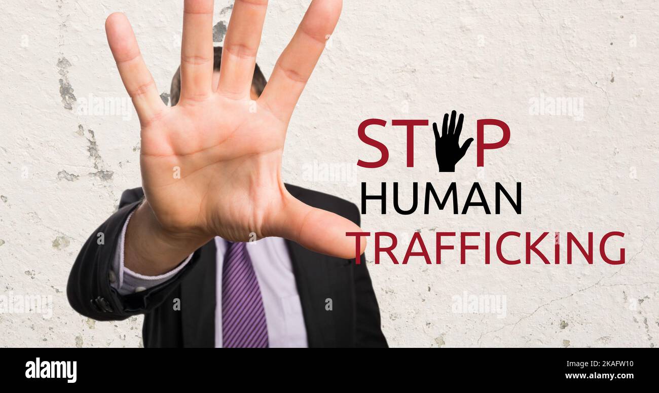 Composite of stop human trafficking text over caucasian businessman ...