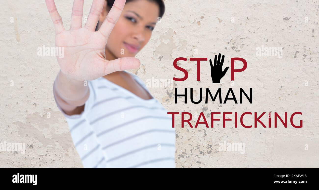 Composite of stop human trafficking text over biracial woman showing ...