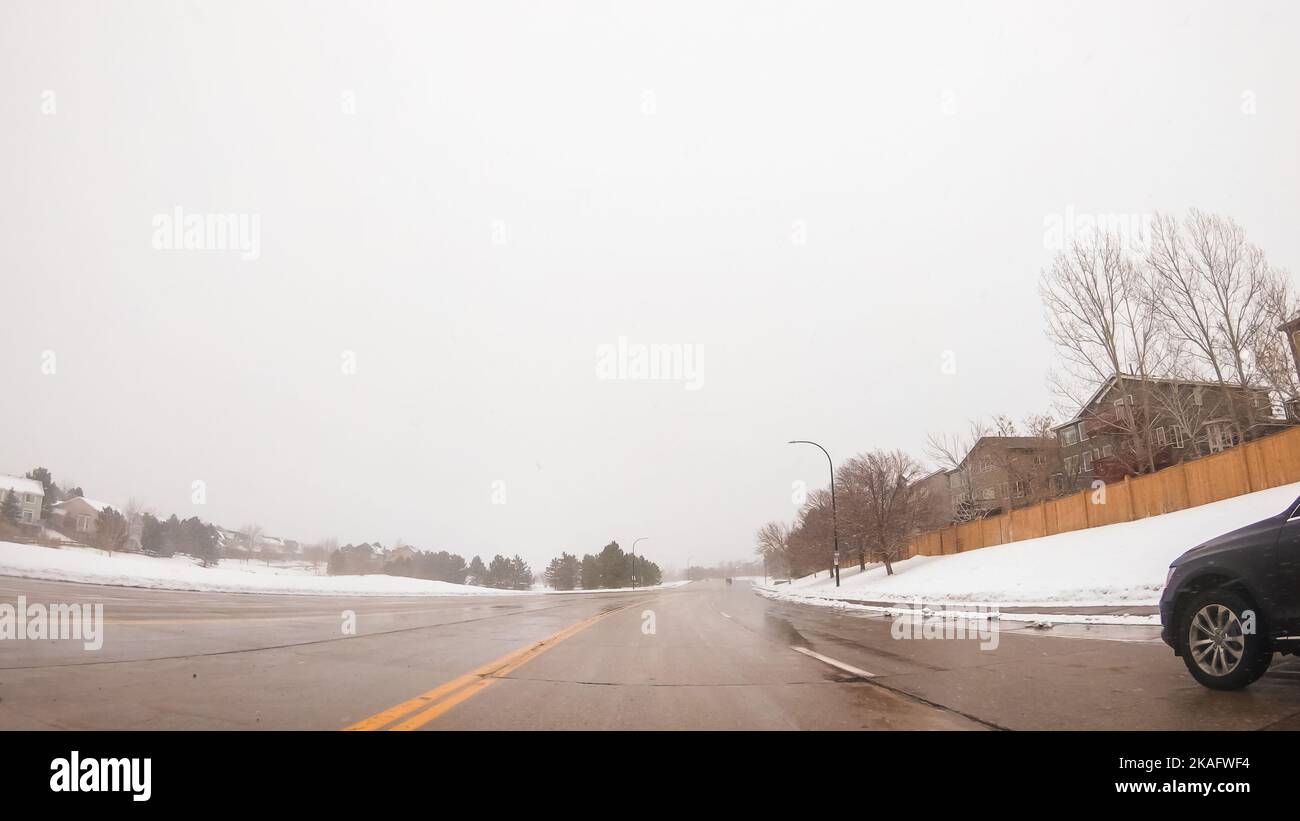 Driving in suburban area Stock Photo - Alamy