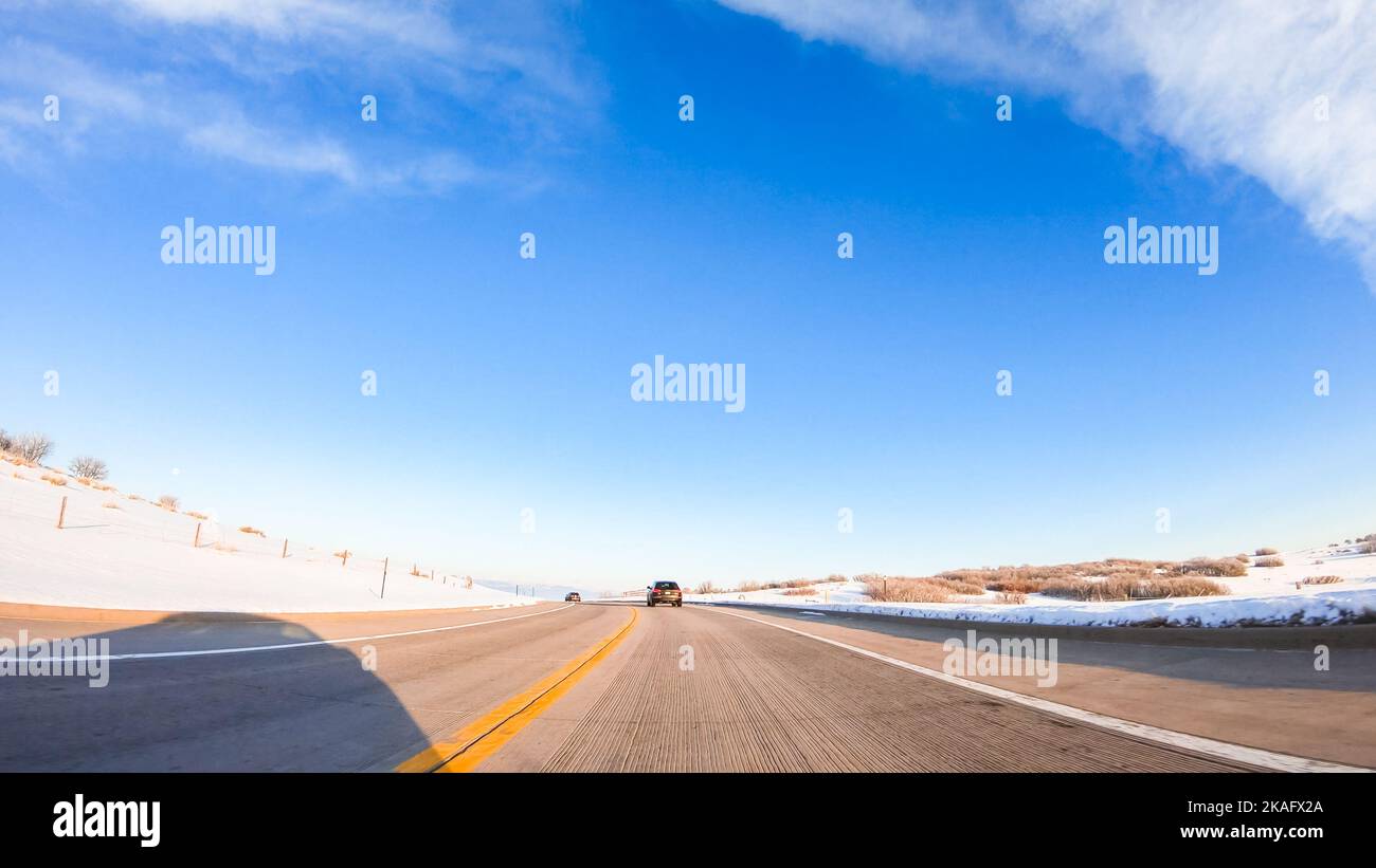 Driving in suburban area Stock Photo - Alamy