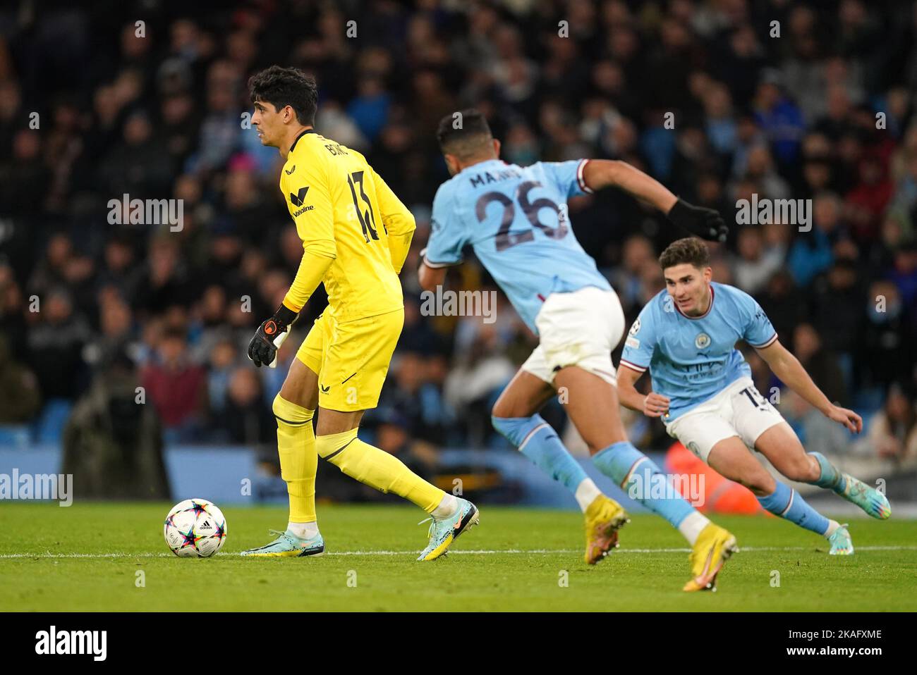 Sevilla goalkeeper Yassine Bounou controls the ball under pressure ...