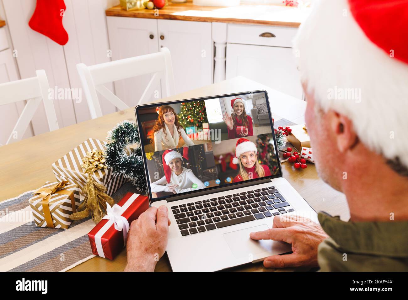 Caucasian man with santa hat having video call with happy caucasian ...
