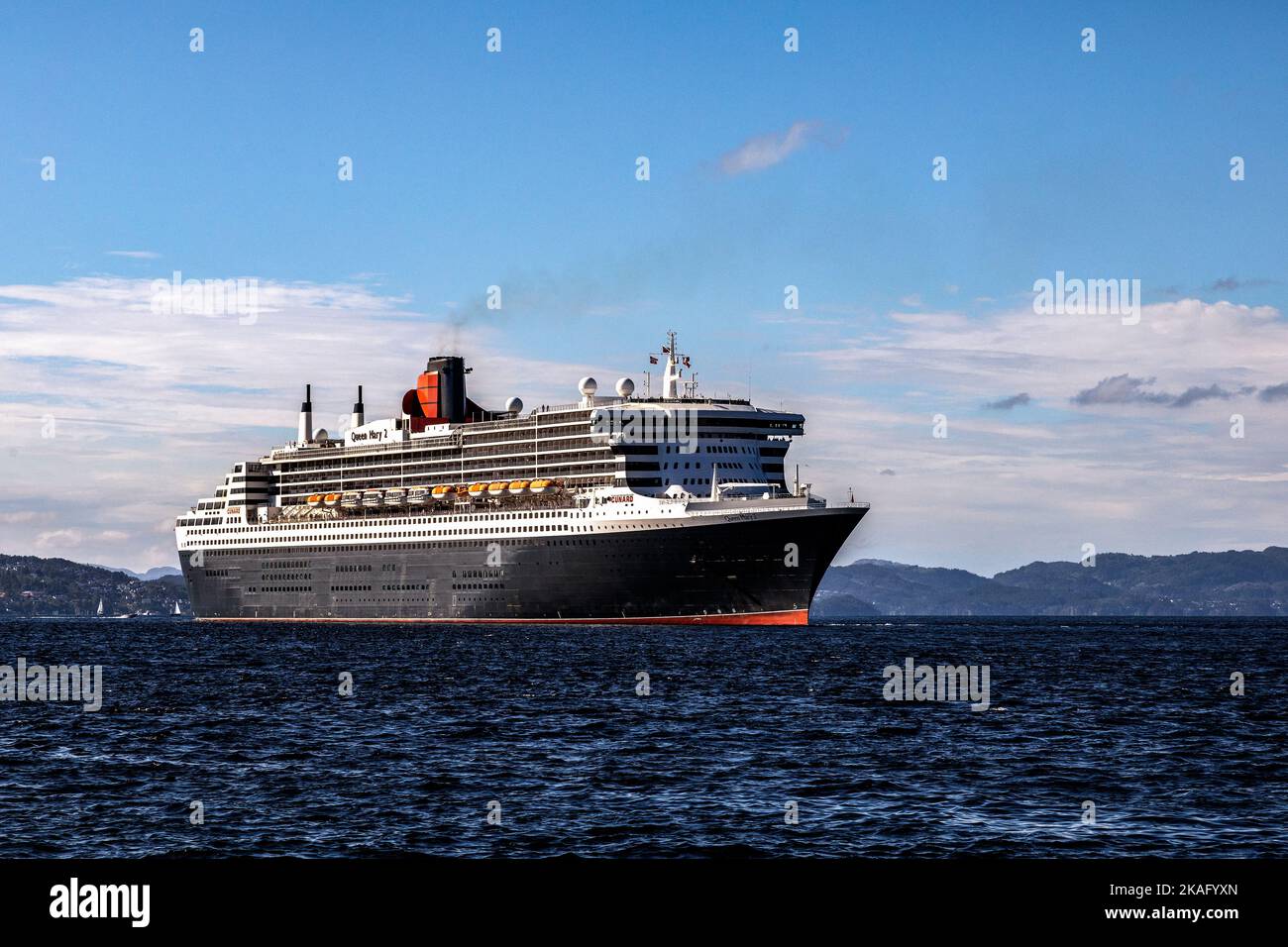 Cruise ship Queen Mary 2 at Byfjorden, ready to depart from the port of ...