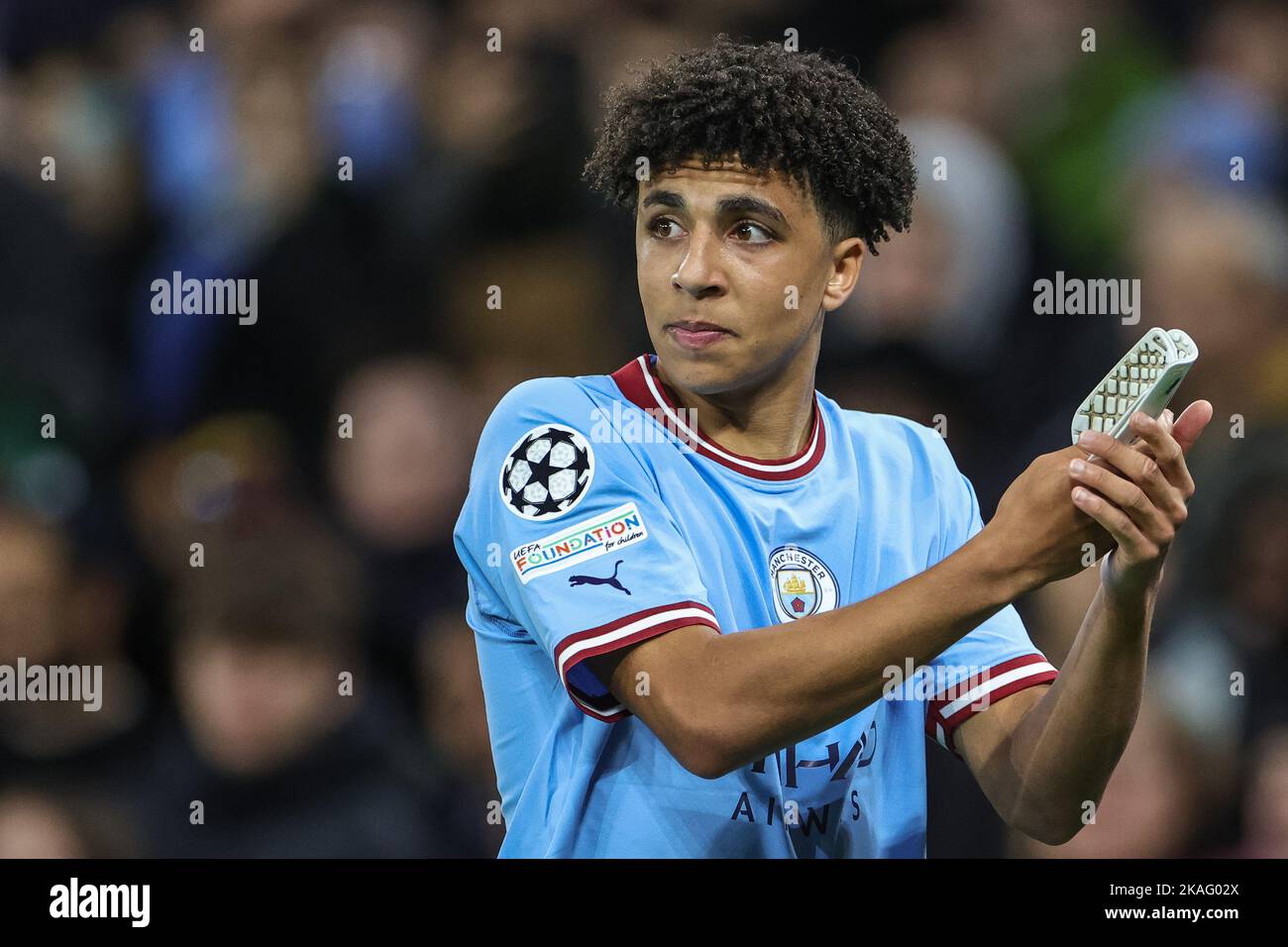 Rico Lewis #82 of Manchester City applauds the home fans during the ...