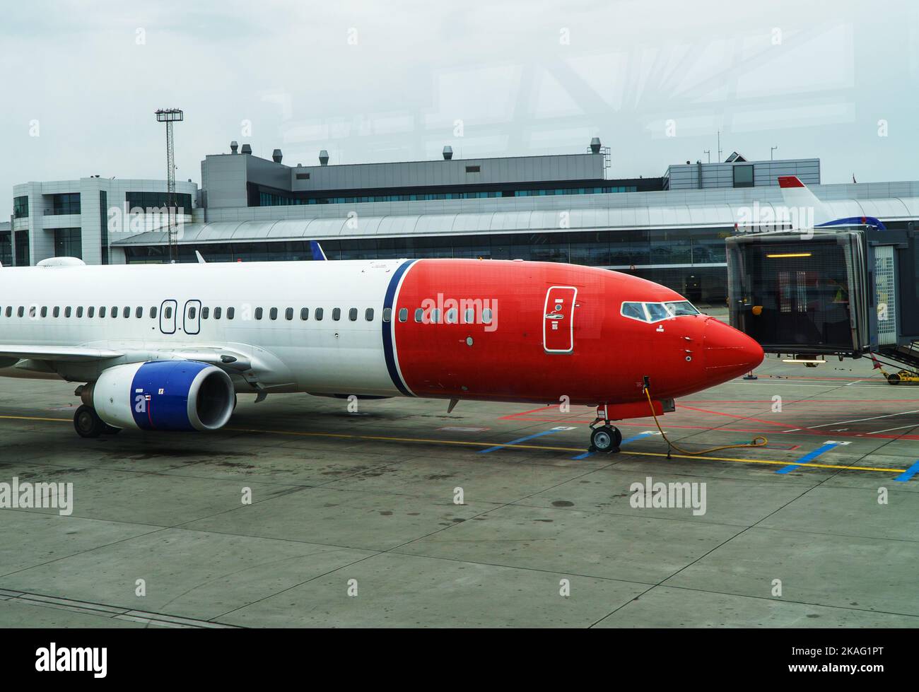 View of airplane on airfield in airport Stock Photo - Alamy