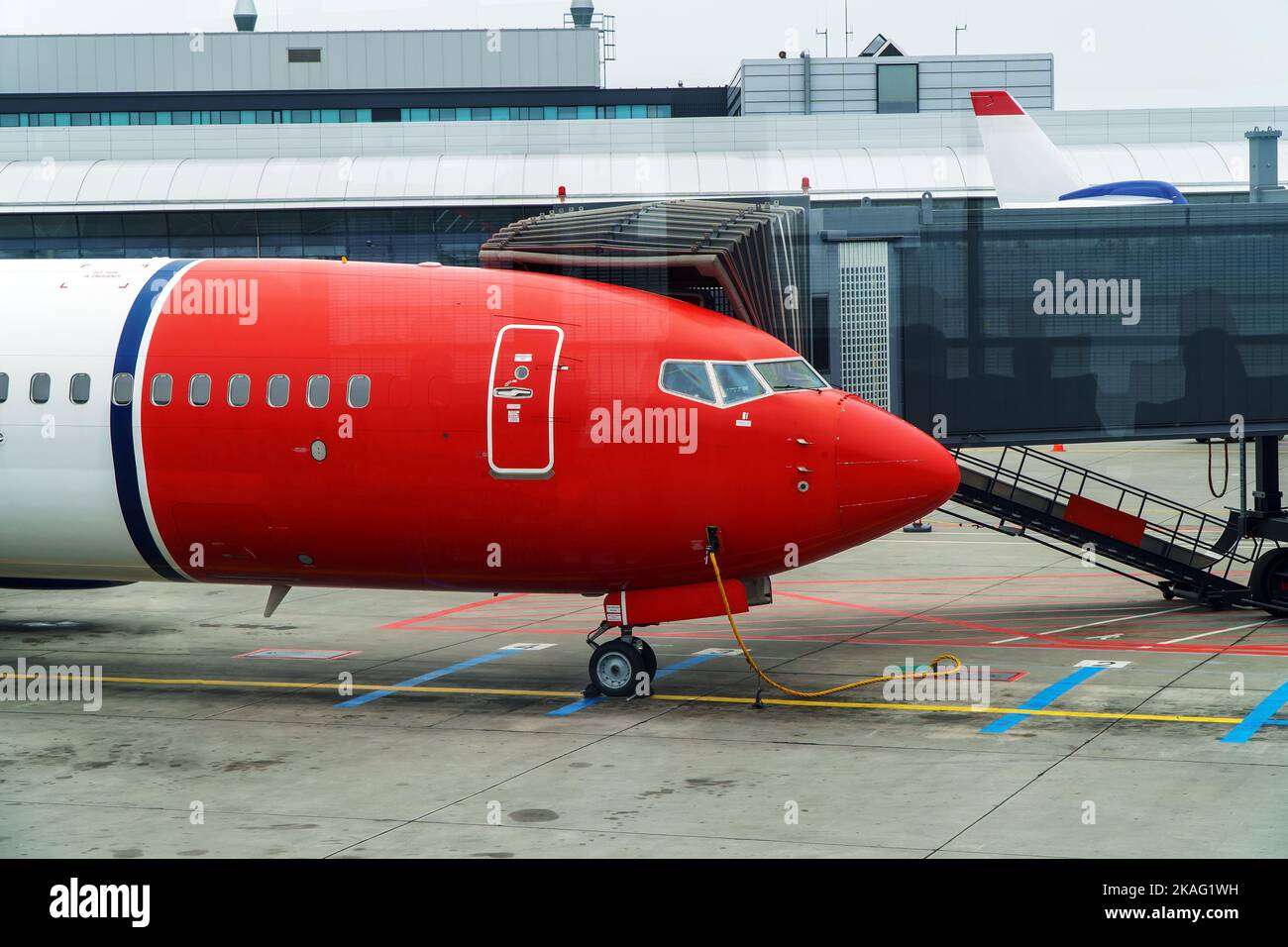View of airplane on airfield in airport Stock Photo - Alamy
