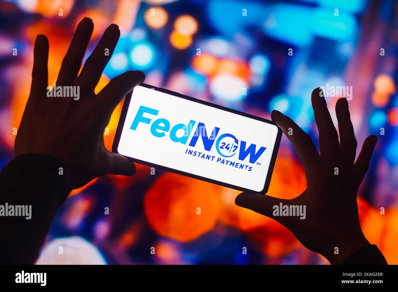 In this photo illustration, the FedNow Service logo is displayed on a ...