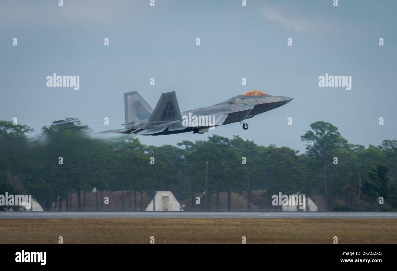 A 325th Fighter Wing F-22A Raptor takes off for a mission Oct. 28 at ...